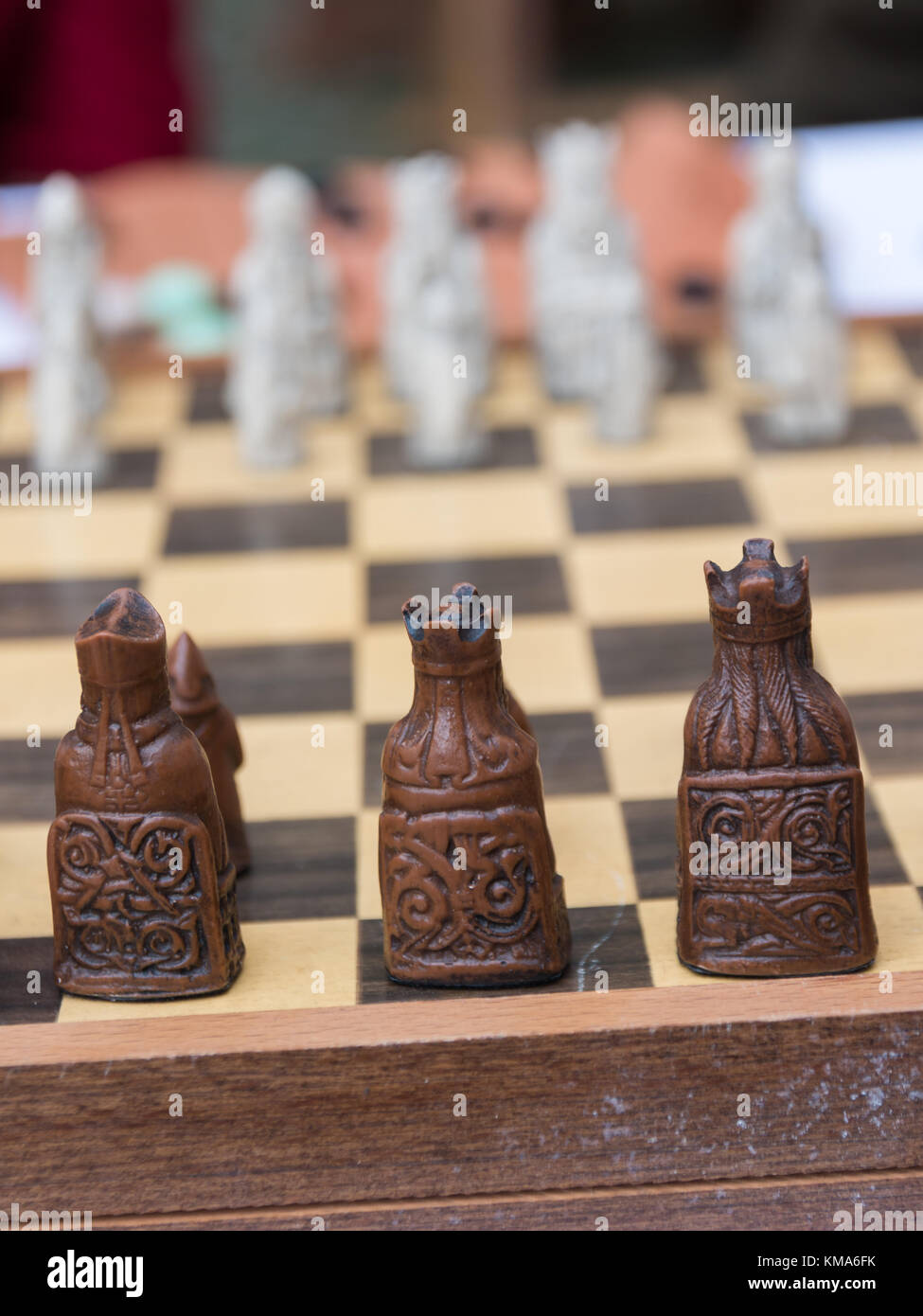 Closeup of Artistic Chess Pieces on Wooden Board: Strategy and ...