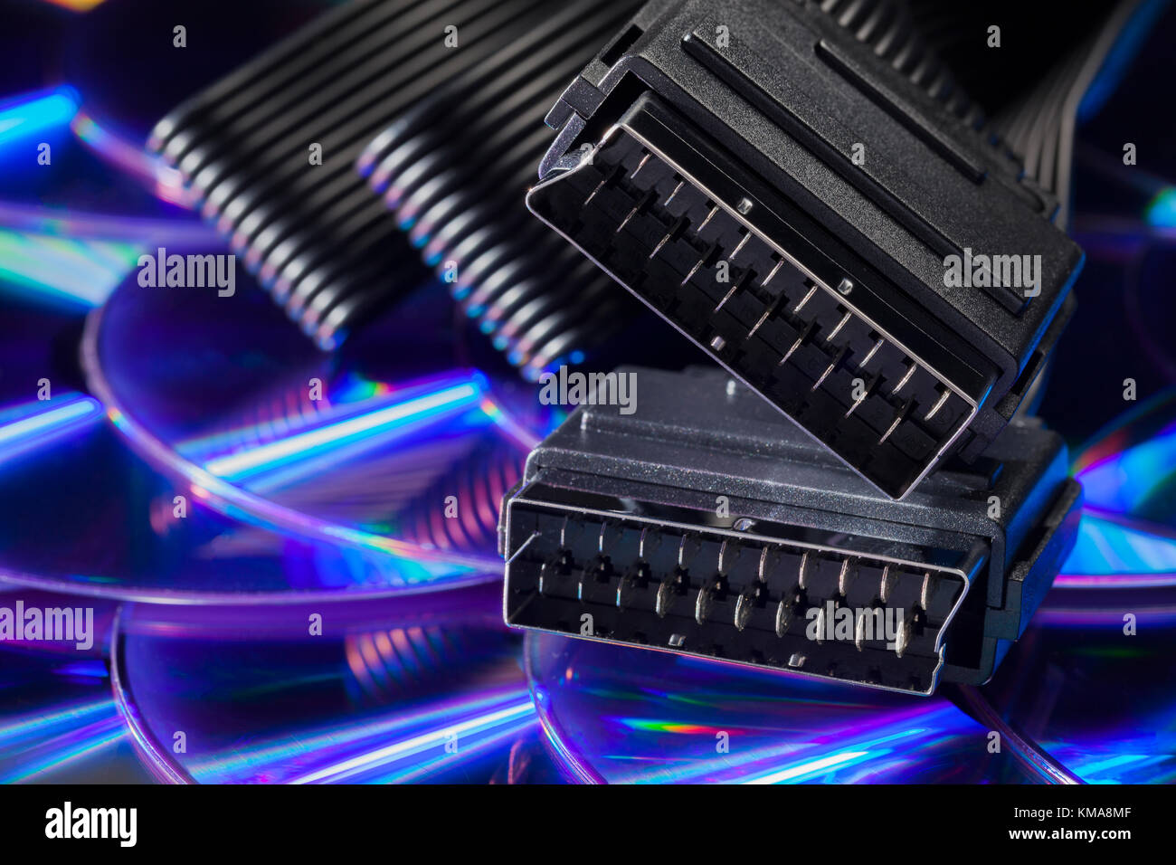 Vintage Scart cable with dvds in the background Stock Photo - Alamy