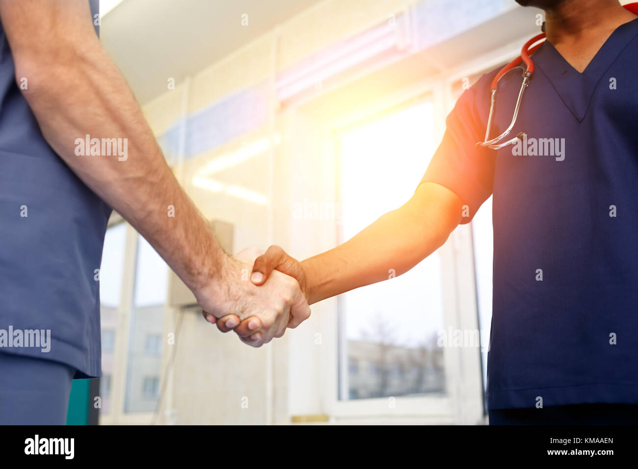 Doctor business man shake hands hi-res stock photography and images - Alamy