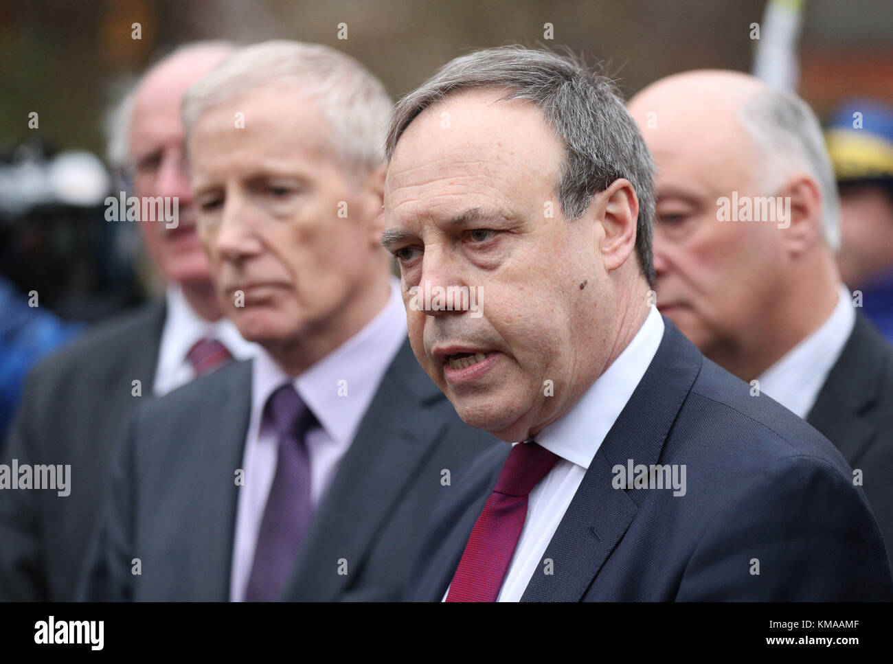 Deputy leader Nigel Dodds and fellow Westminster DUP MPs speaking in ...