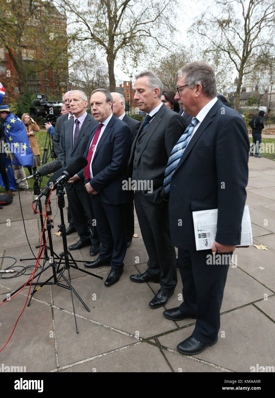 Deputy leader Nigel Dodds and fellow Westminster DUP MPs speaking in ...