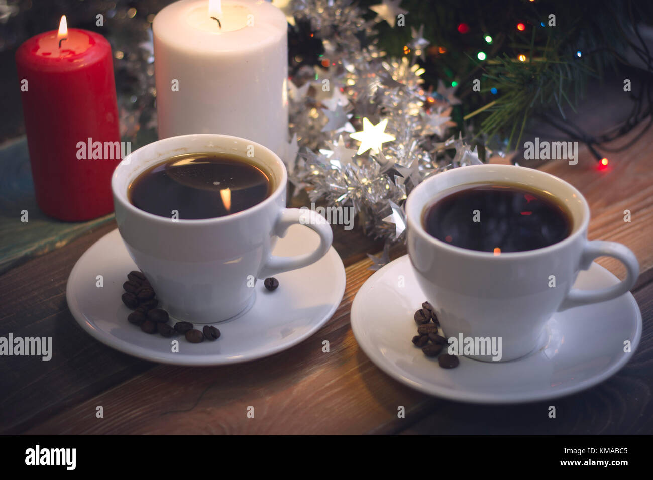 Still life with coffee cups and candles Stock Photo - Alamy