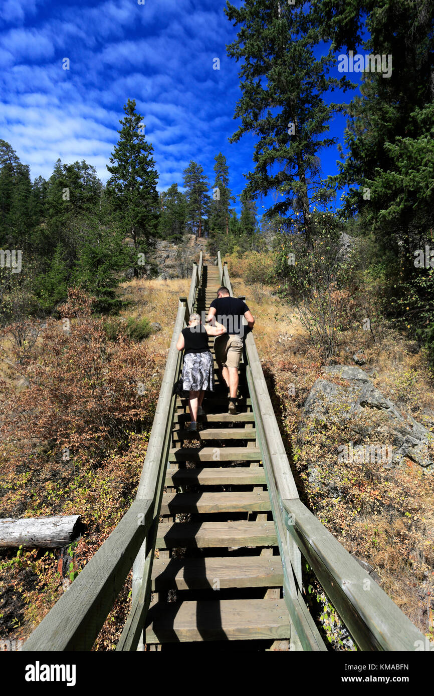 People walking along the waterfalls in Shorts Creek, Fintry Provincial ...