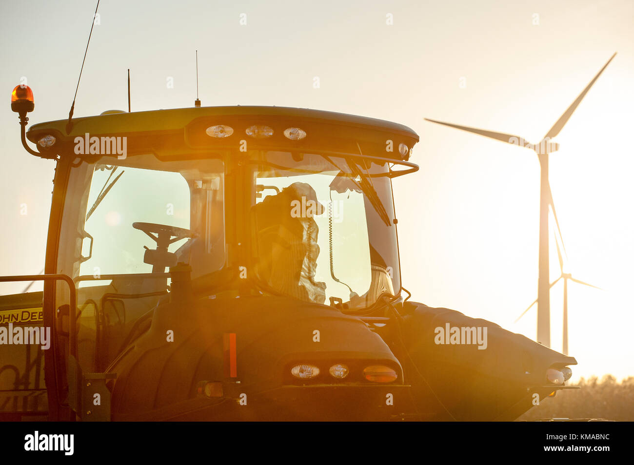 FARMER INSIDE CAB OF JOHN DEERE TRACTOR Stock Photo - Alamy