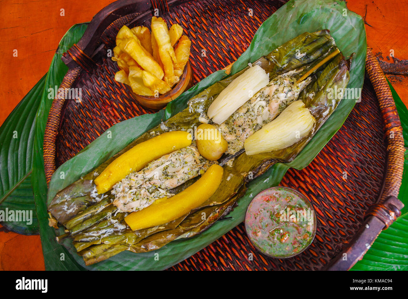 Above view of delicious typical amazonian food, fish cooked in a leaf ...
