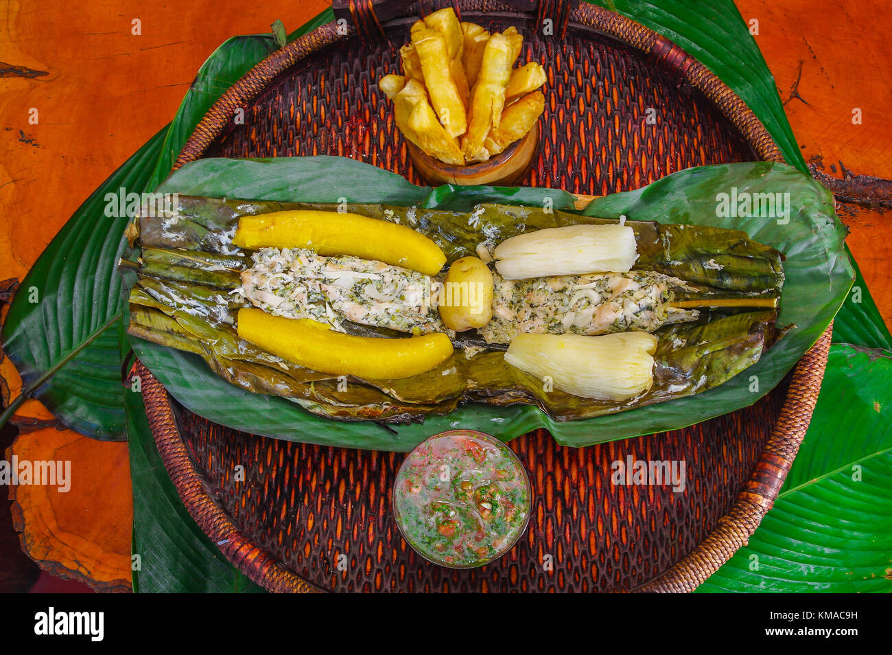 Above view of delicious typical amazonian food, fish cooked in a leaf ...