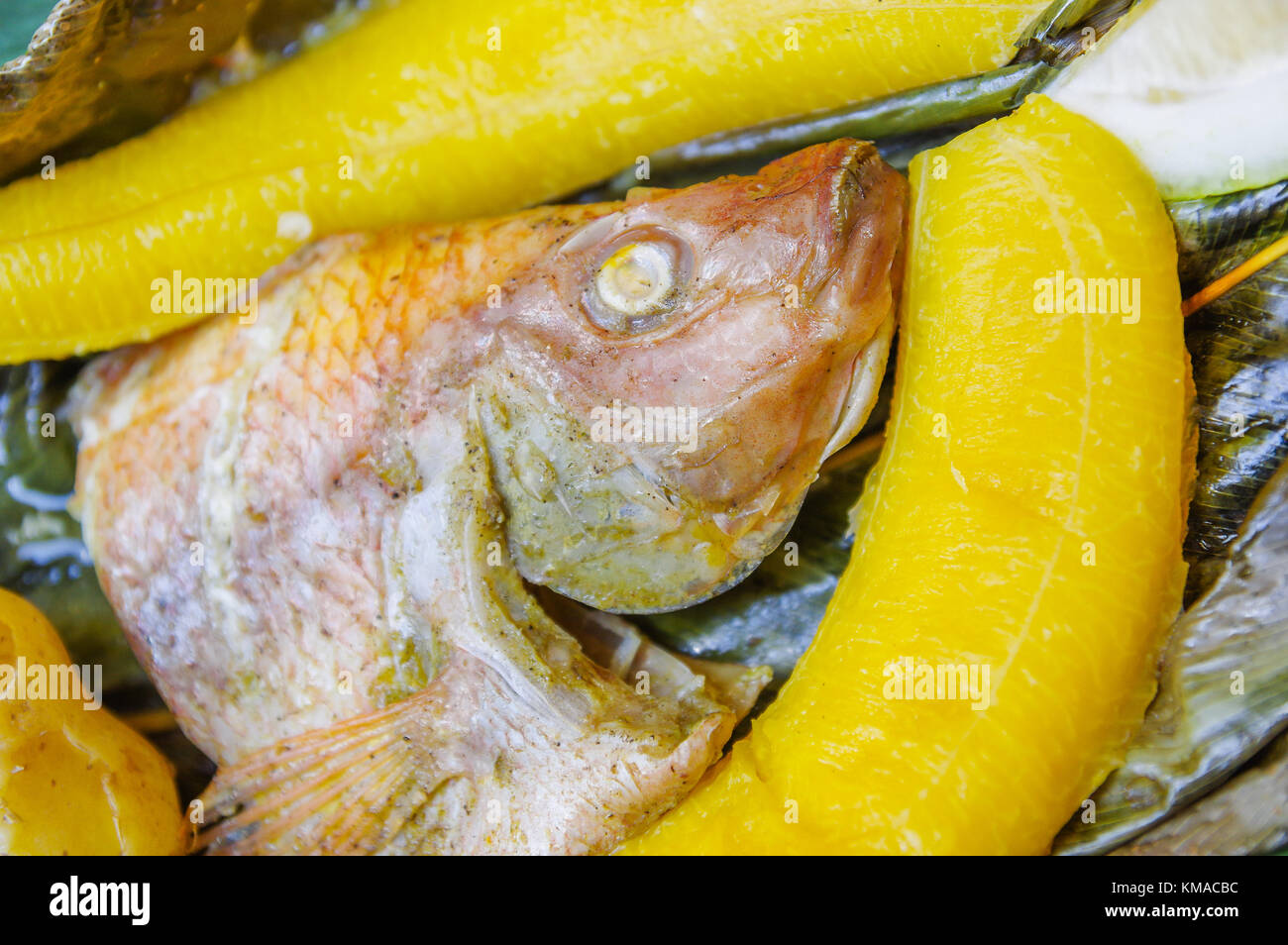 Close up of delicious typical amazonian food, fish cooked in a leaf ...
