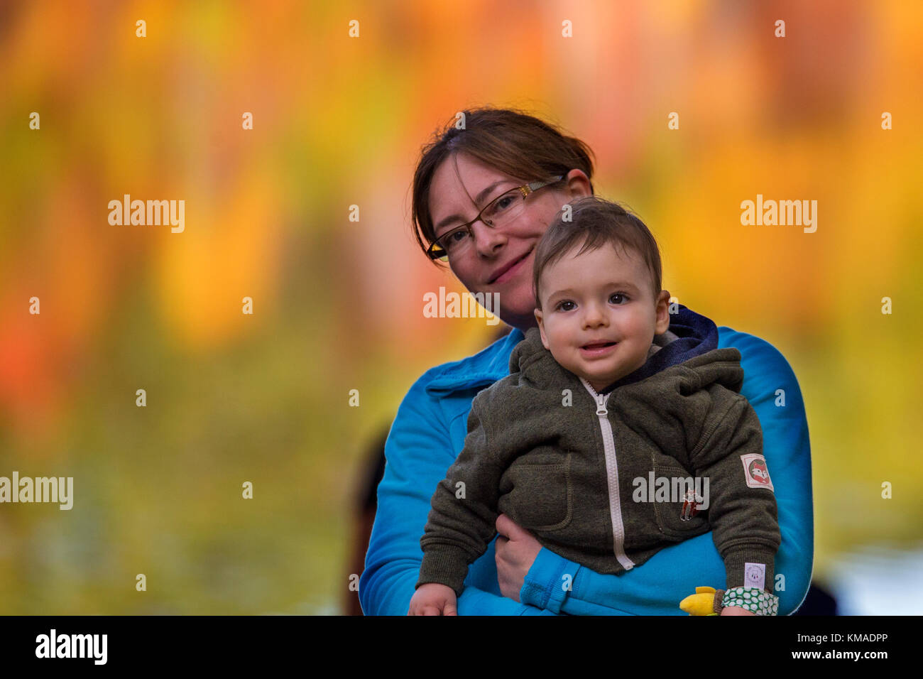 mother and baby in canadian autumn Stock Photo - Alamy