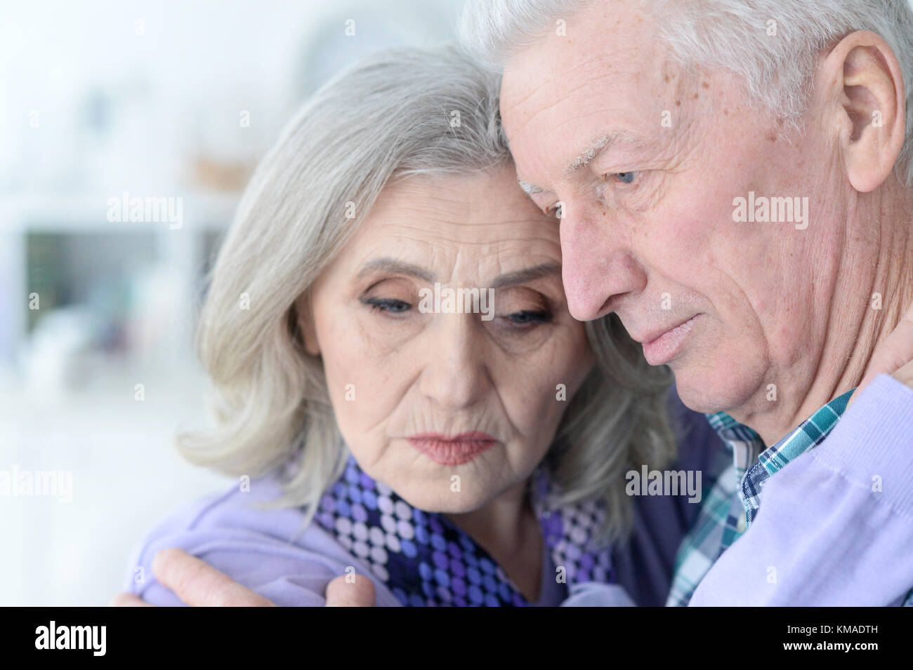 Sad senior couple Stock Photo - Alamy