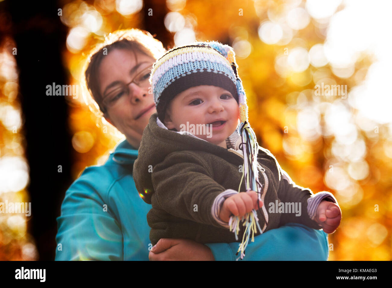 Baby boy in fall forest Stock Photo - Alamy