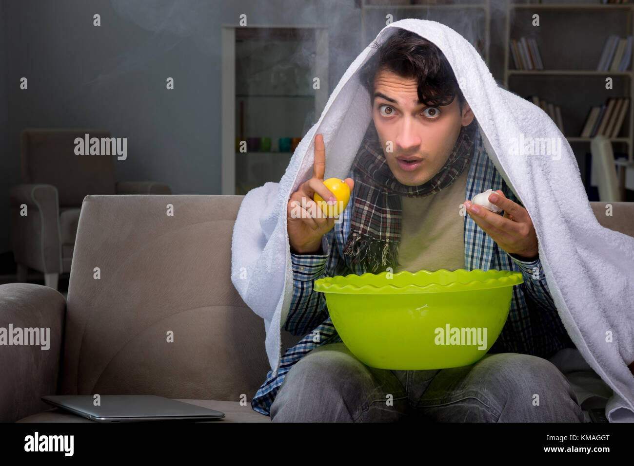 Sick man doing inhalation at night in home Stock Photo - Alamy