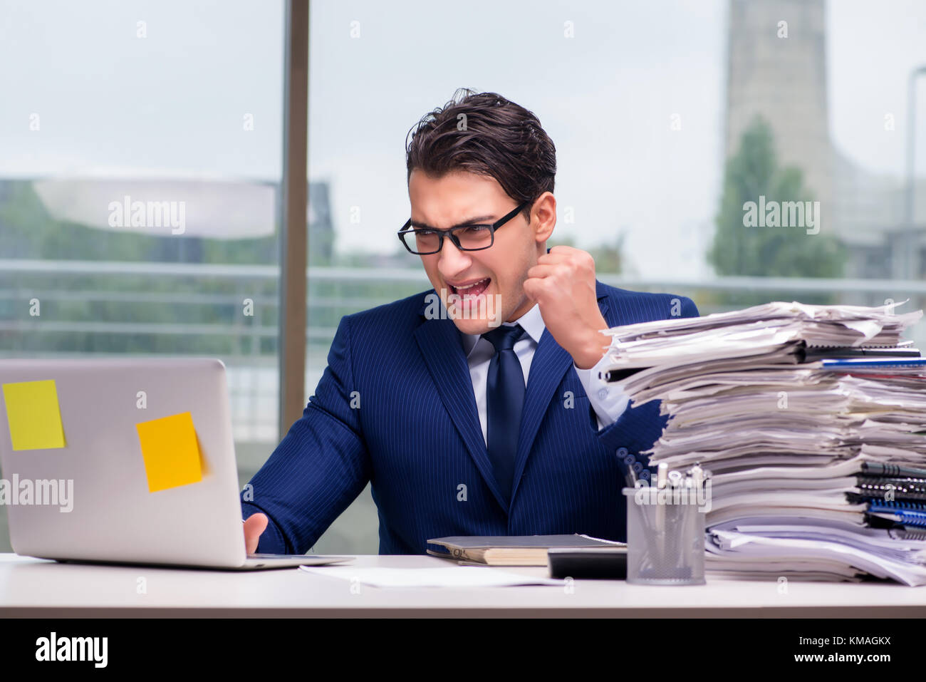 Workaholic businessman overworked with too much work in office Stock ...