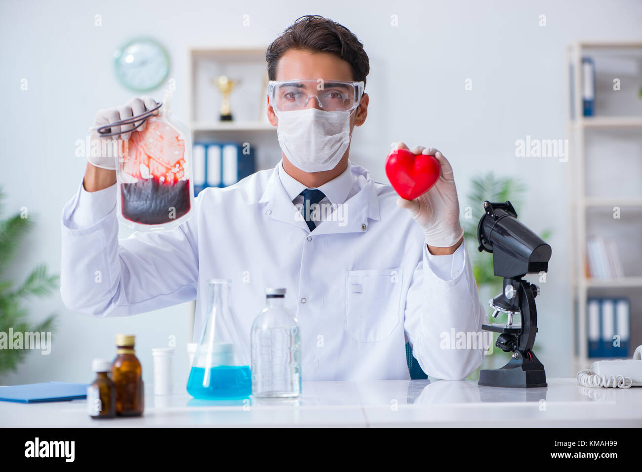 Doctor working with blood samples in hospital clinic lab Stock Photo ...