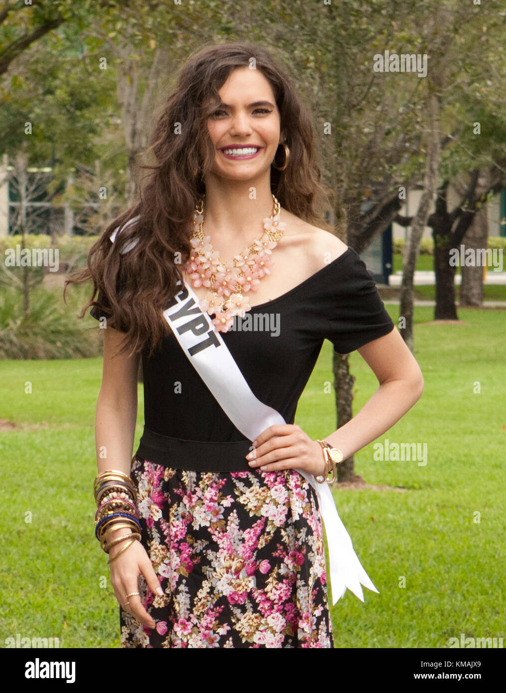 DORAL, FL - JANUARY 21: Lara Debbane, Miss Egypt 2014, tries on her ...
