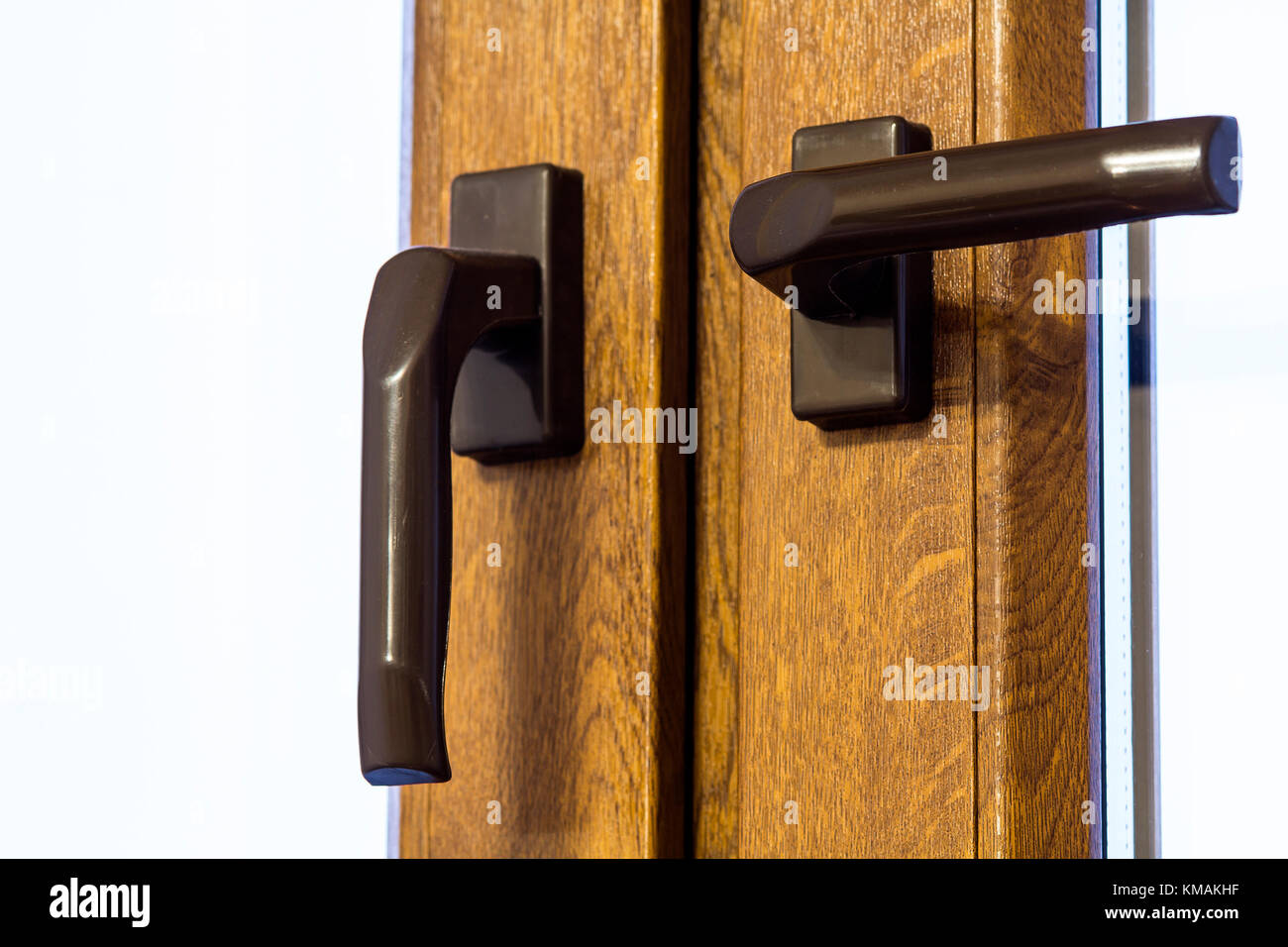 Wooden modern window handle. Home interior detail Stock Photo - Alamy