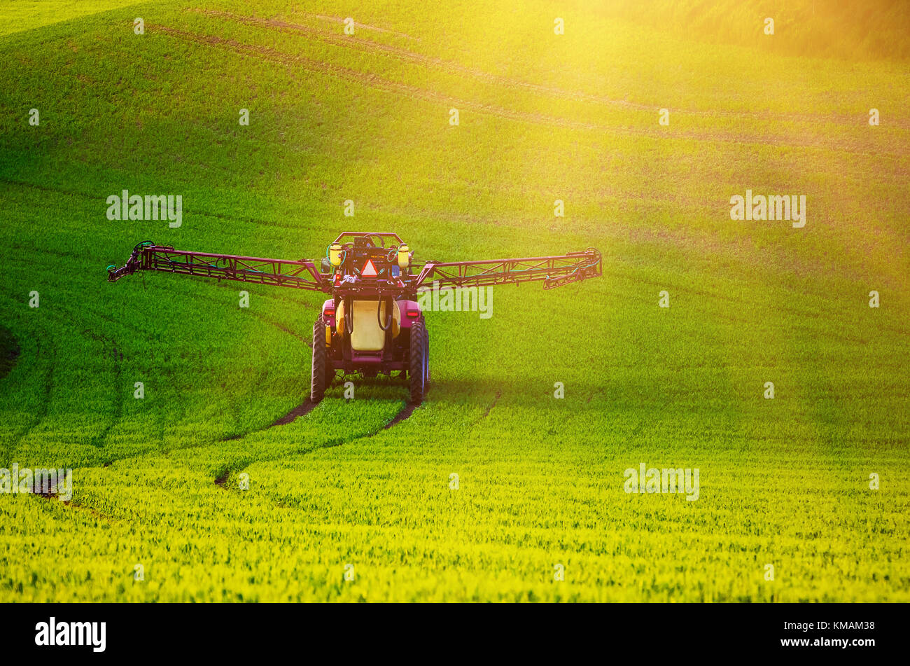 Farm machinery spraying insecticide Stock Photo - Alamy