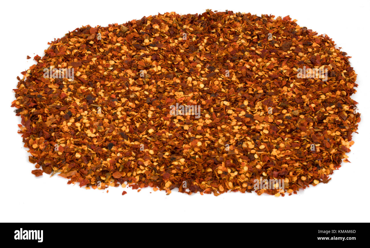 Dried chili pieces red pepper crushes isolated on white background ...