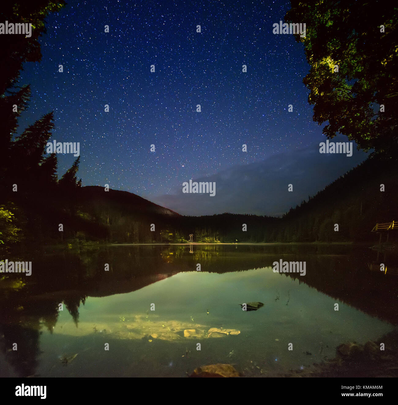 Mountain lake at night Stock Photo - Alamy