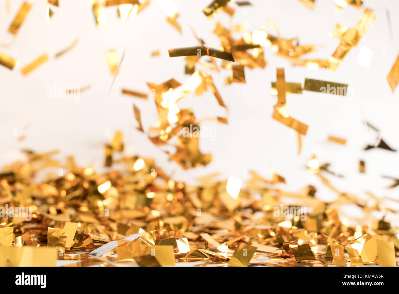 Golden colored confetti hi-res stock photography and images - Alamy