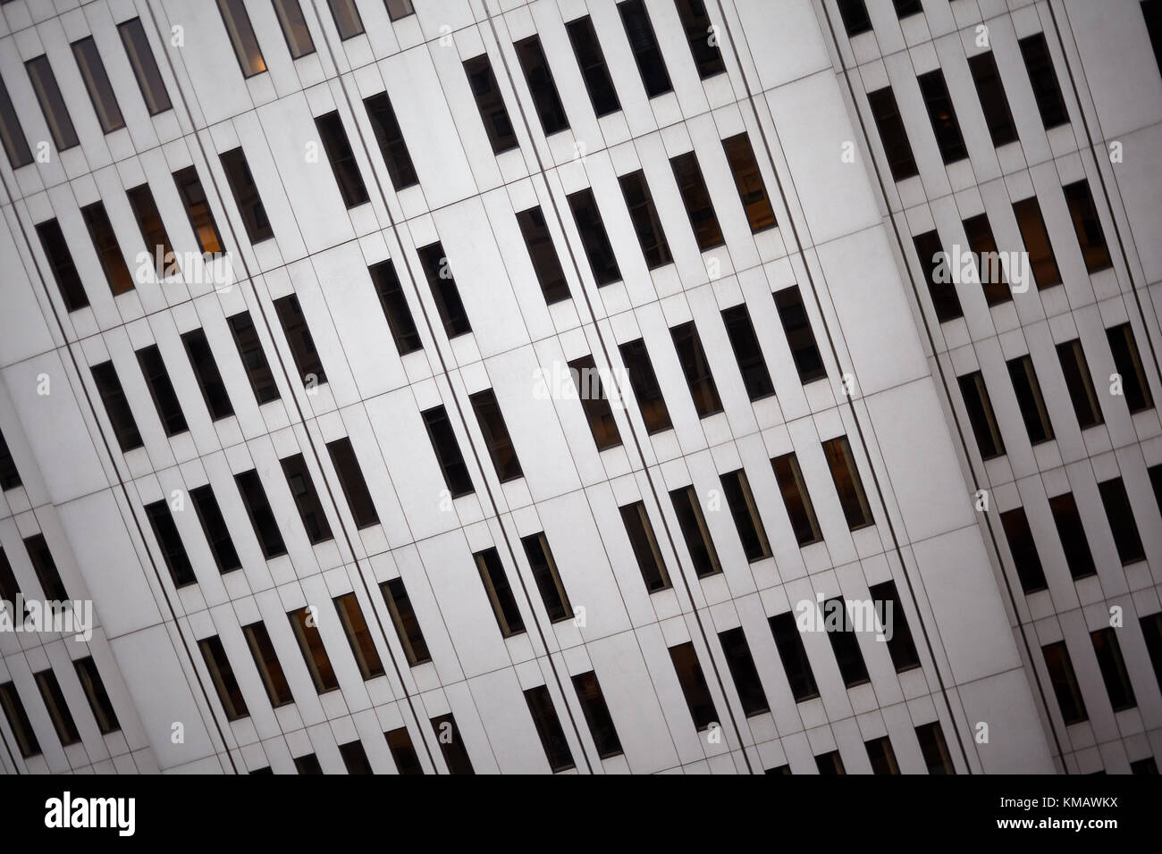Tilted angle view of a commercial building facade with rows of long ...