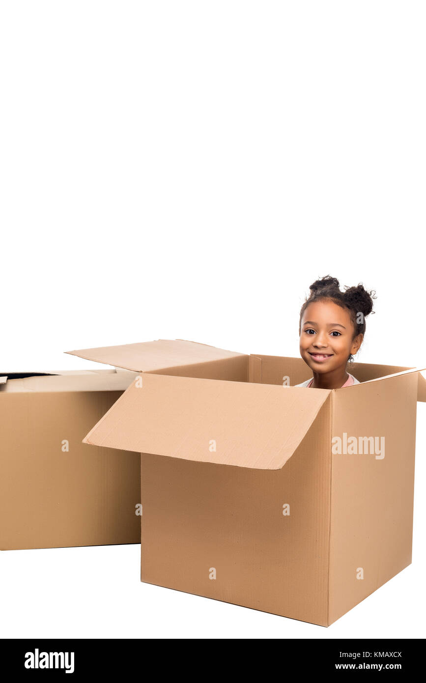 kid sitting in cardboard box Stock Photo - Alamy
