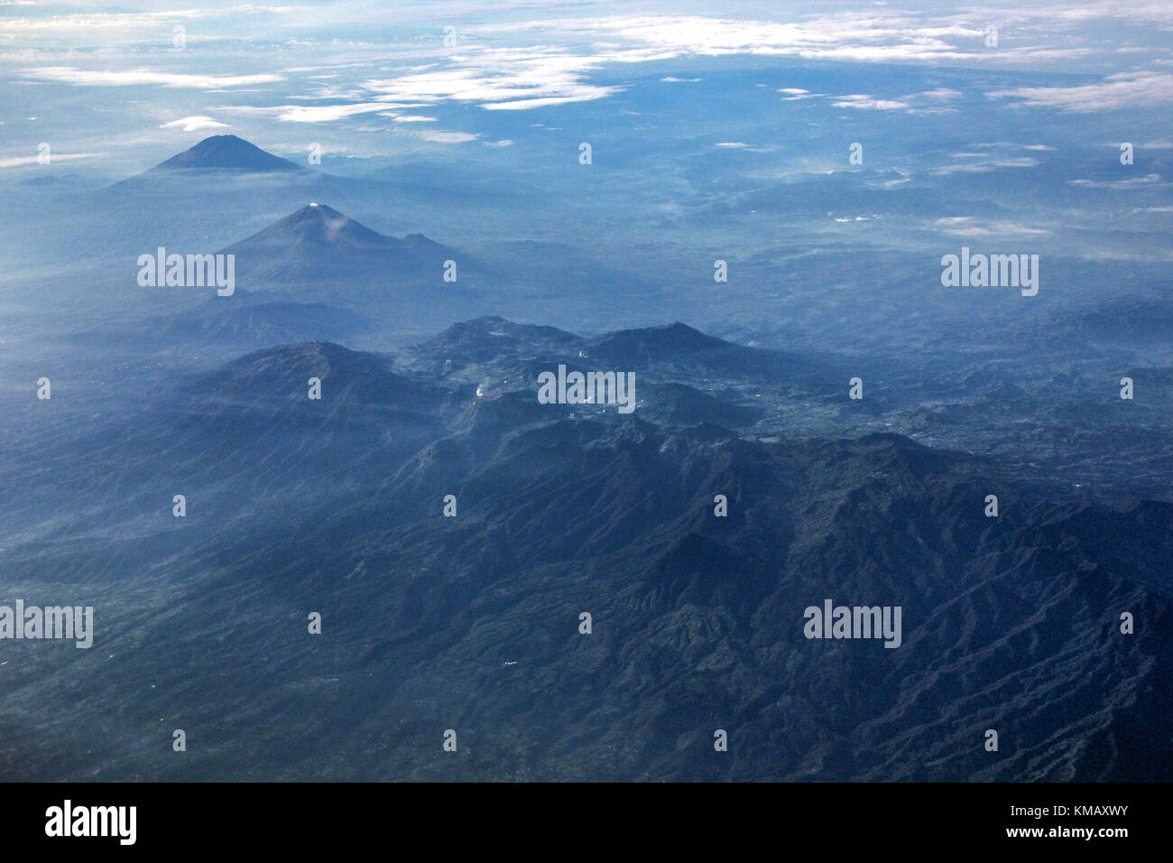 Volcano over Java island. These area mount Sindoro, mount Sumbing and ...