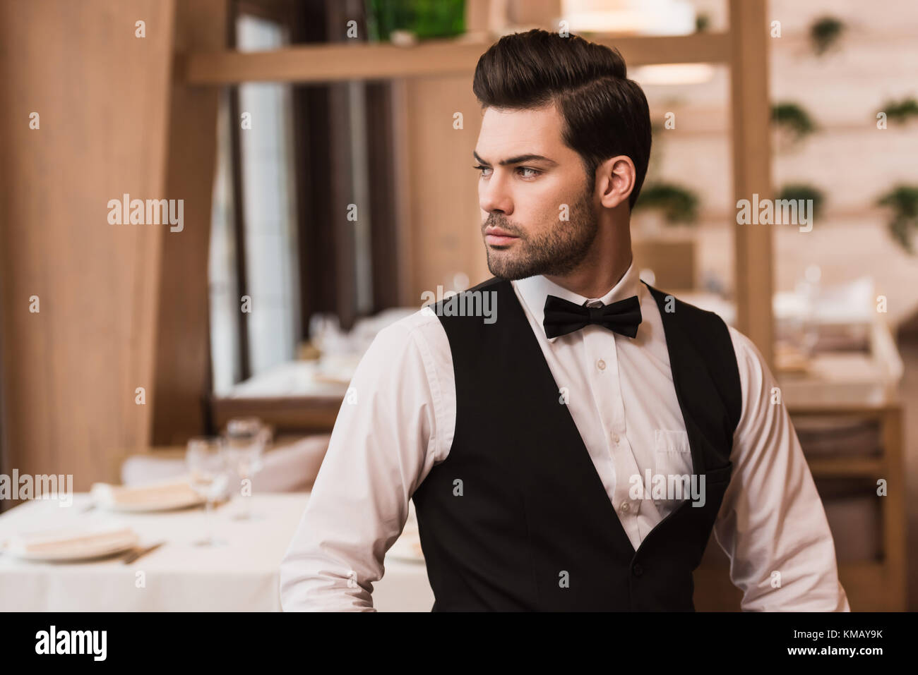 Handsome waiter Stock Photo - Alamy