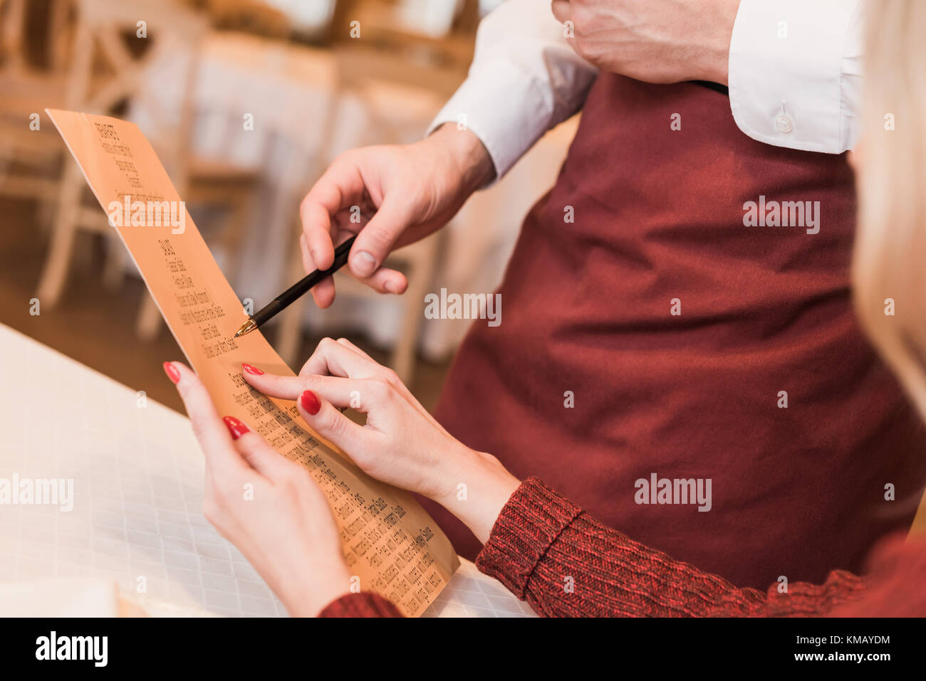 customer asking waiter about menu Stock Photo - Alamy