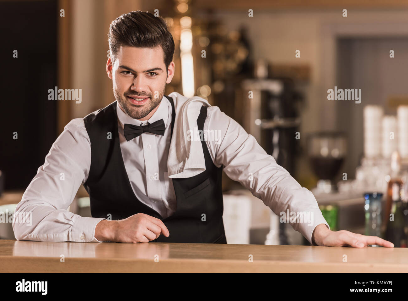 Service smile young barman hi-res stock photography and images - Alamy