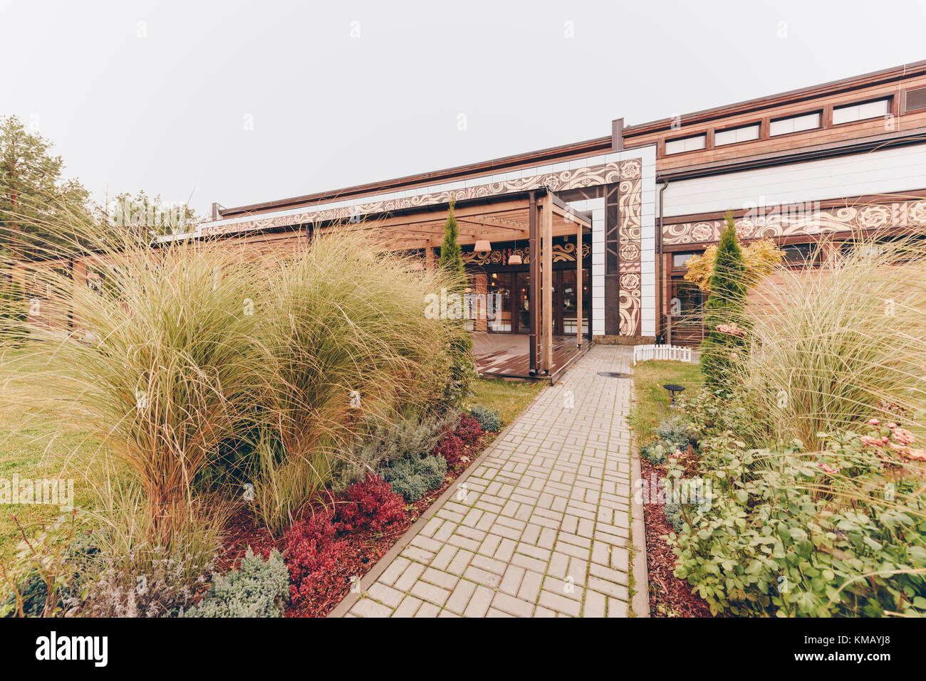 Entrance to wooden decorated building Stock Photo - Alamy