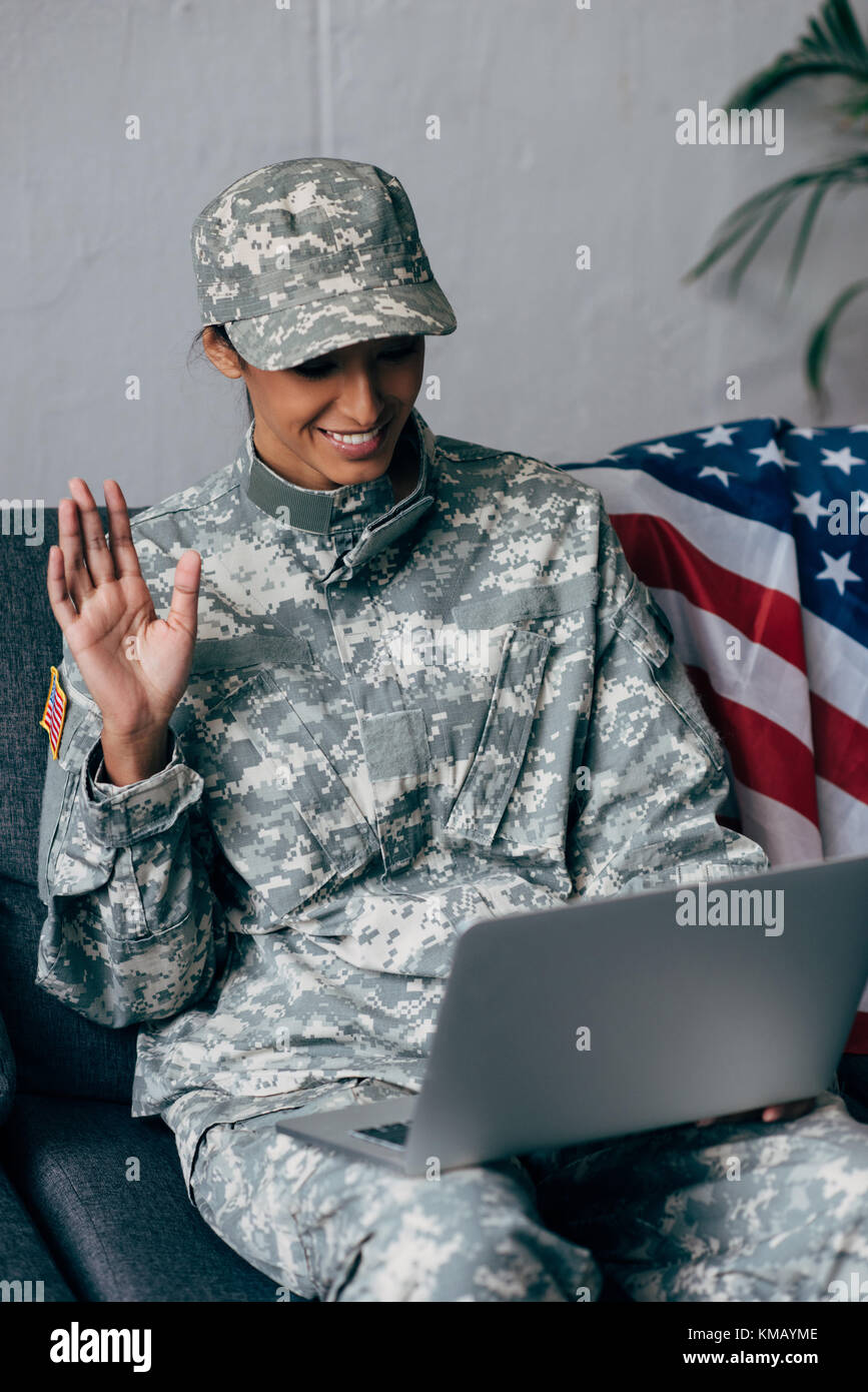 soldier making video call with laptop Stock Photo - Alamy