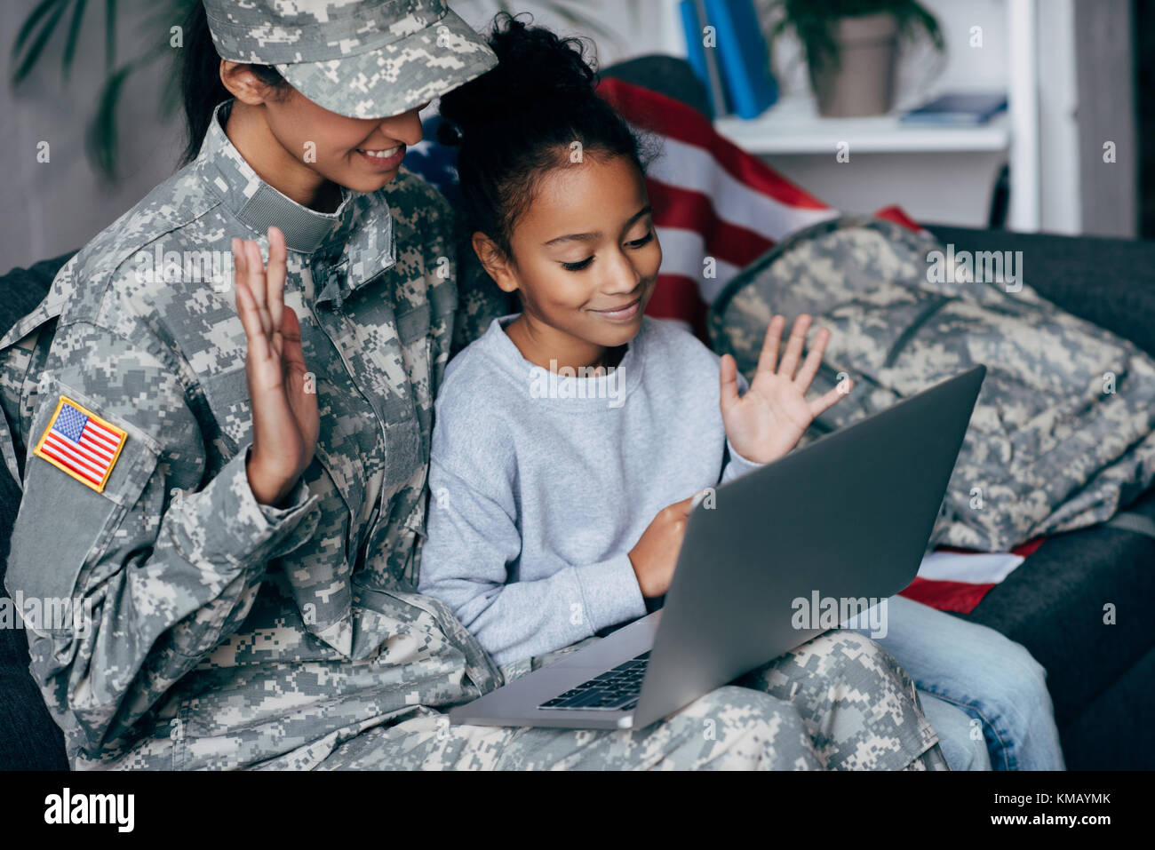 soldier and child making video call Stock Photo - Alamy