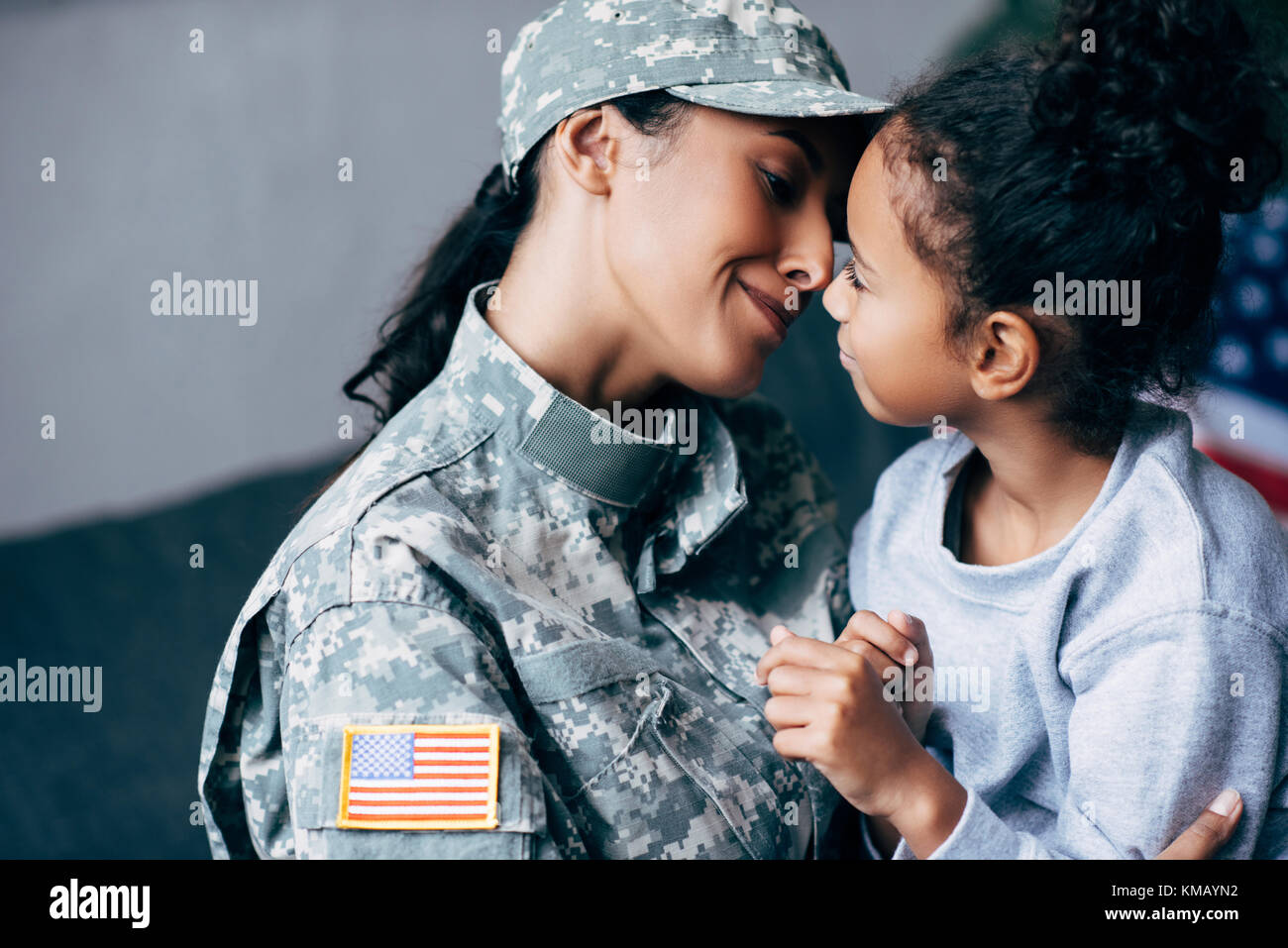 mother in military uniform and daughter Stock Photo - Alamy