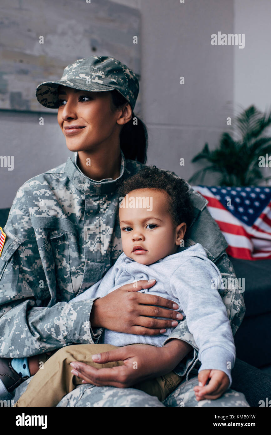 soldier with baby Stock Photo - Alamy