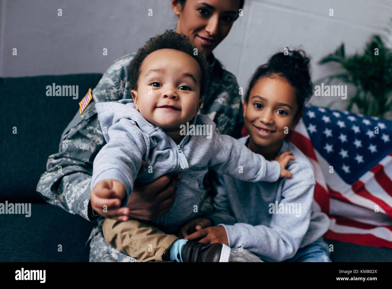 children with mother in military uniform Stock Photo - Alamy
