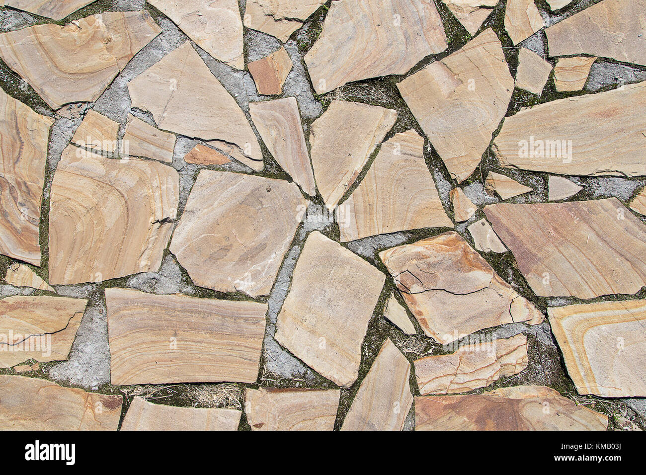 paving blocks of yellow stone on the road Stock Photo - Alamy