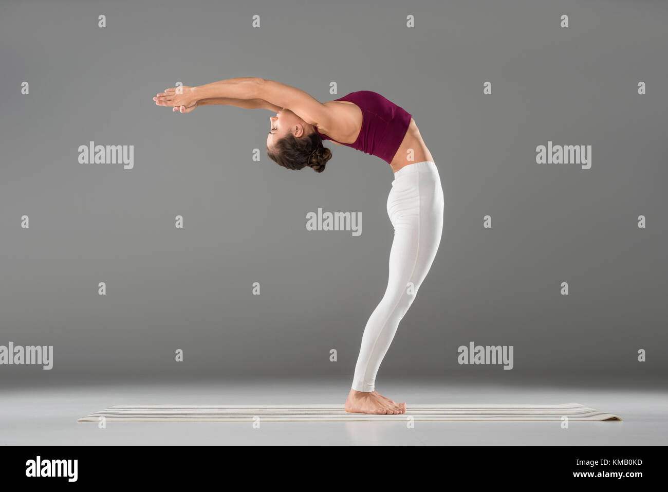 woman standing in yoga pose Stock Photo - Alamy