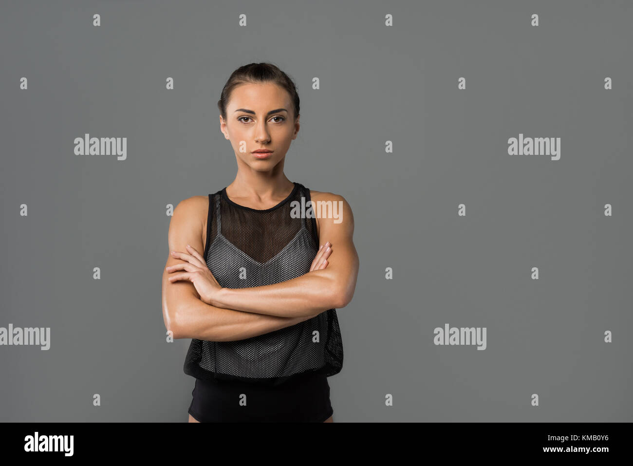 beautiful girl with crossed arms Stock Photo - Alamy