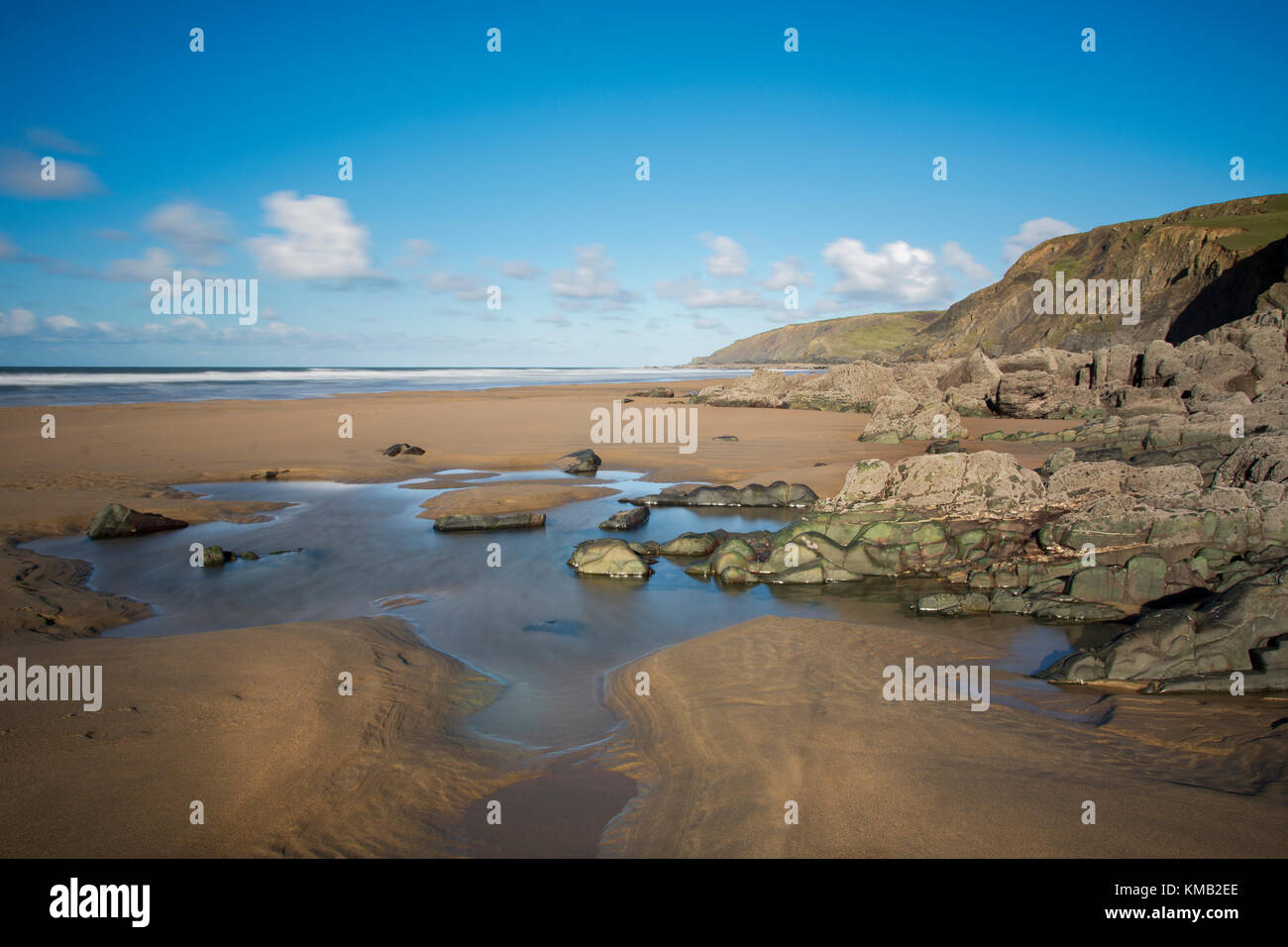 Rock pools , cliffs and the sandy beach of Sandymouth bay Cornwall ...