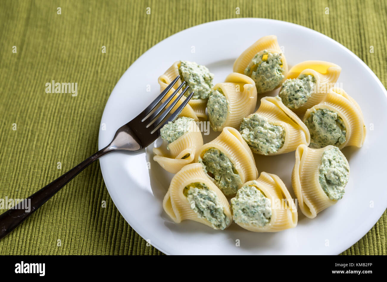 Stuffed lumaconi with cheese Stock Photo - Alamy