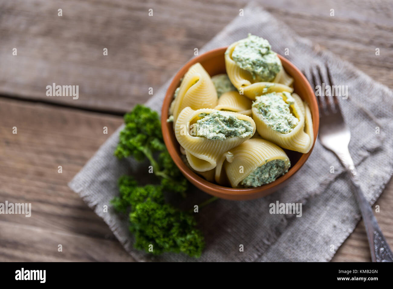 Stuffed lumaconi with cheese Stock Photo - Alamy