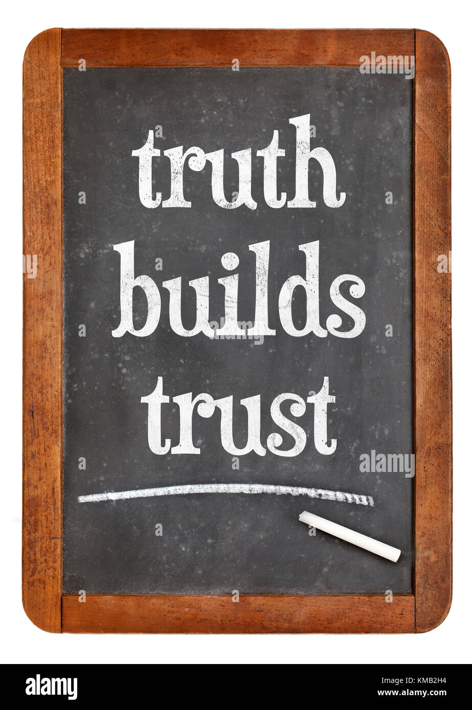 Truth builds trust - white chalk text on a vintage slate blackboard ...