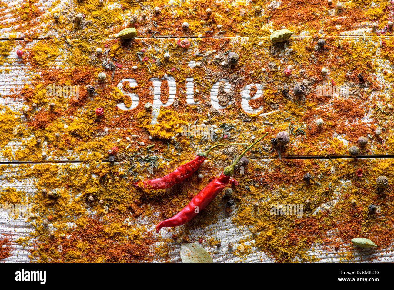 scattered spices on table and word Spice Stock Photo - Alamy