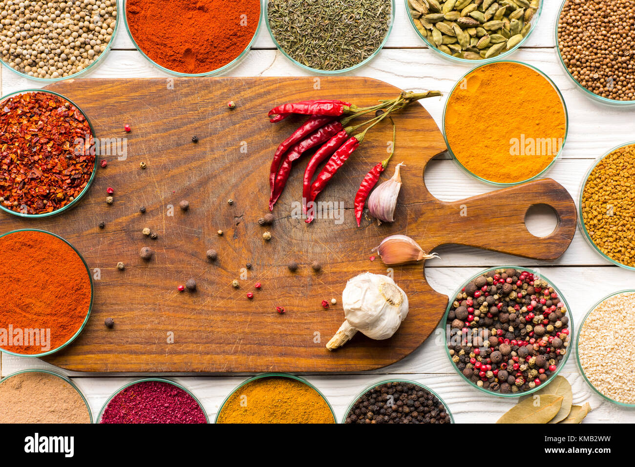 wooden board and colorful spices Stock Photo - Alamy