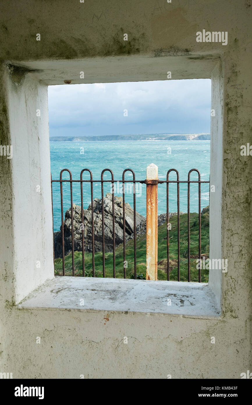 The North Cornwall coast seen through a window of a building on the top ...