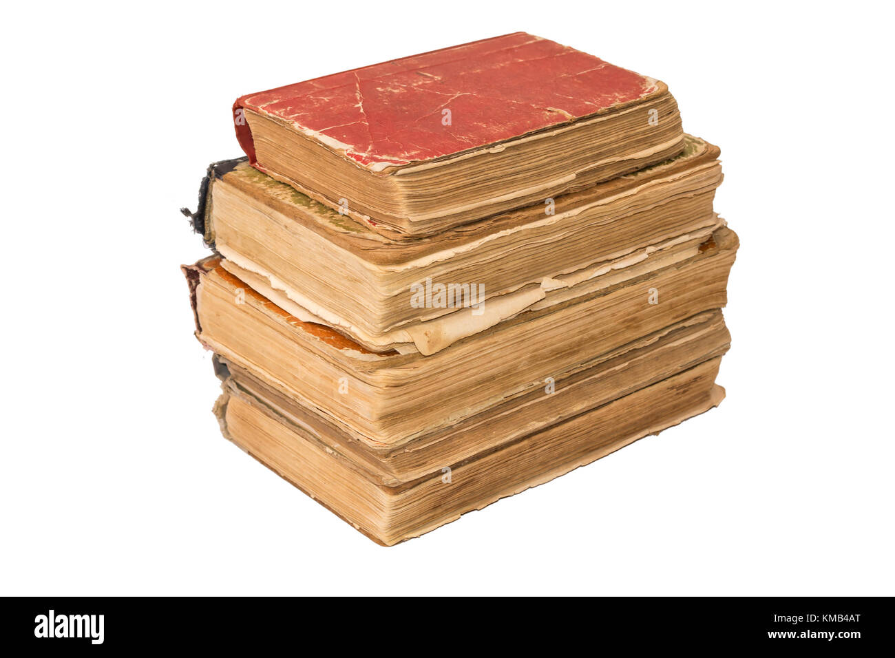 A stack of old tattered books. Vintage torn books. Antiques isolated ...