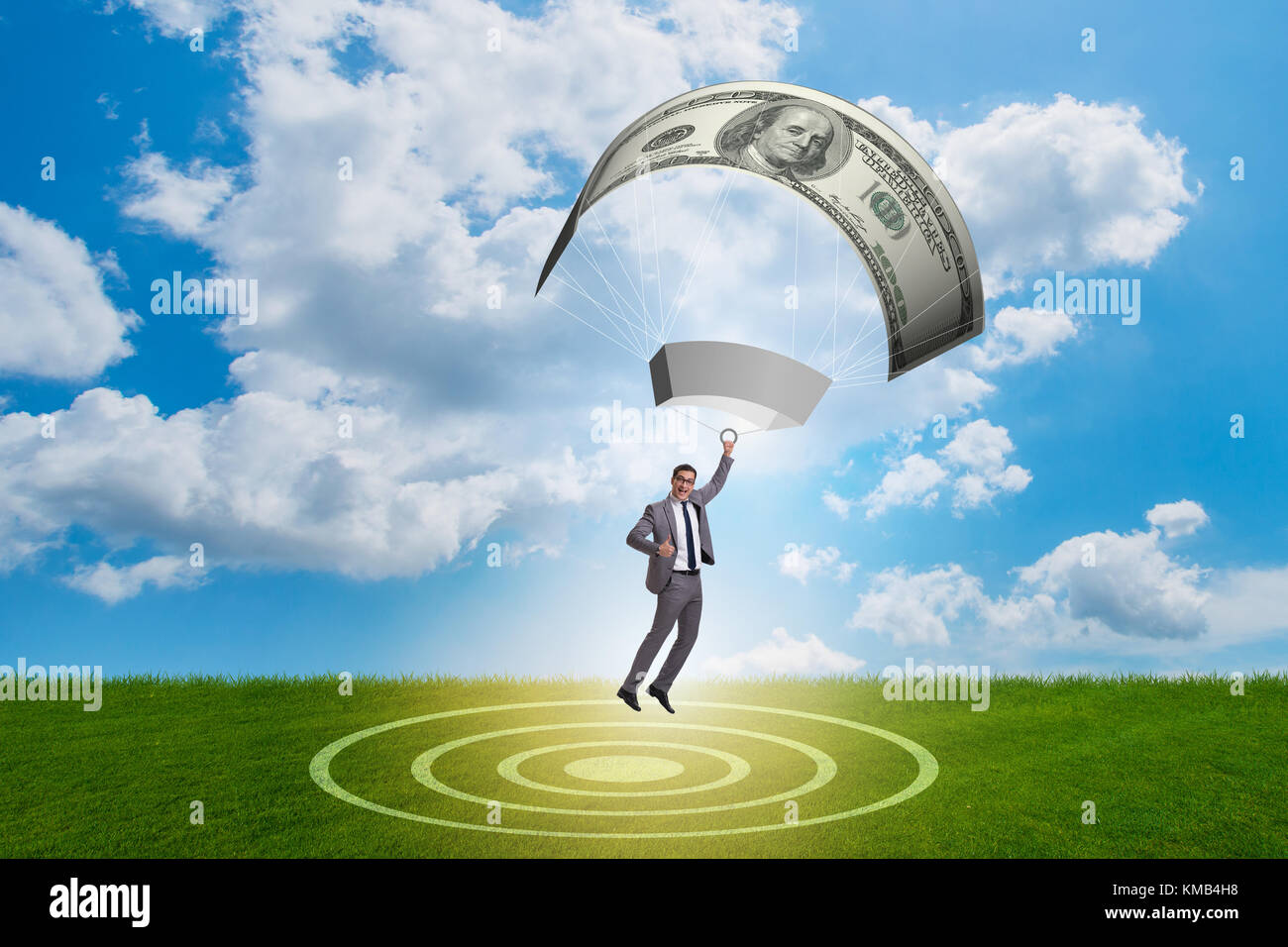 Businessman in golden parachute concept Stock Photo - Alamy