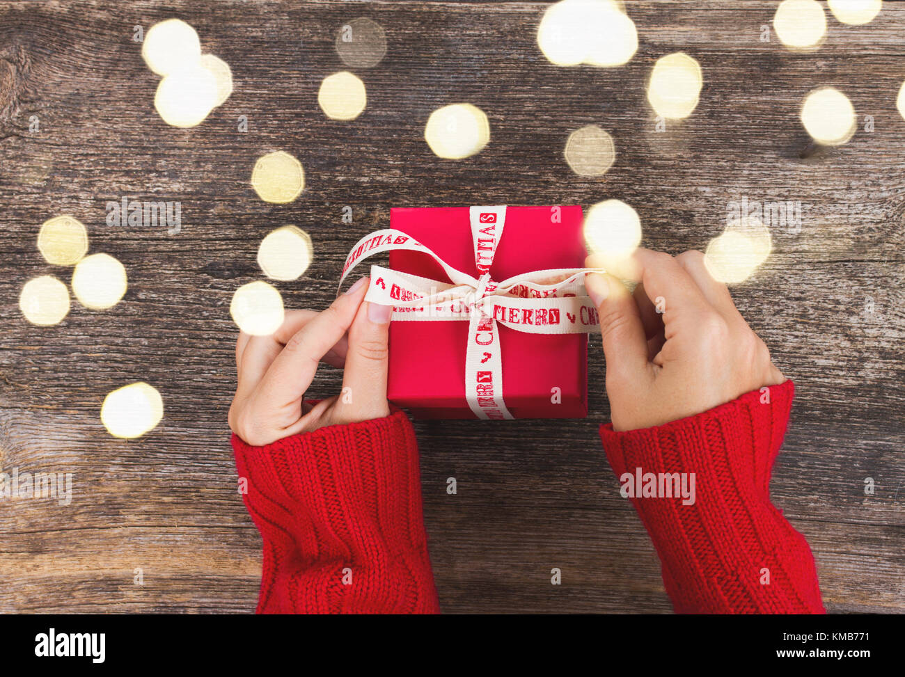 Christmas gift giving Stock Photo - Alamy