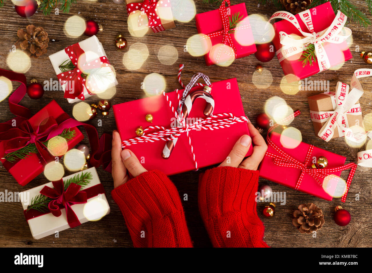 Christmas gift giving Stock Photo - Alamy