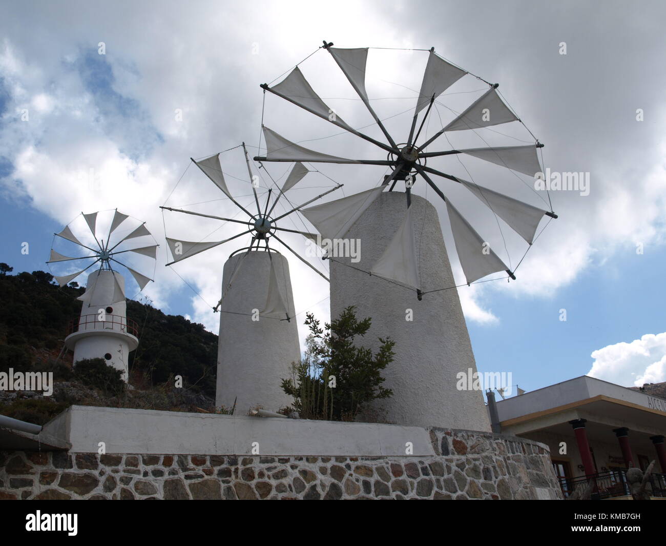 white color daytime photograph of an Ancient Venetian windmill on clear ...